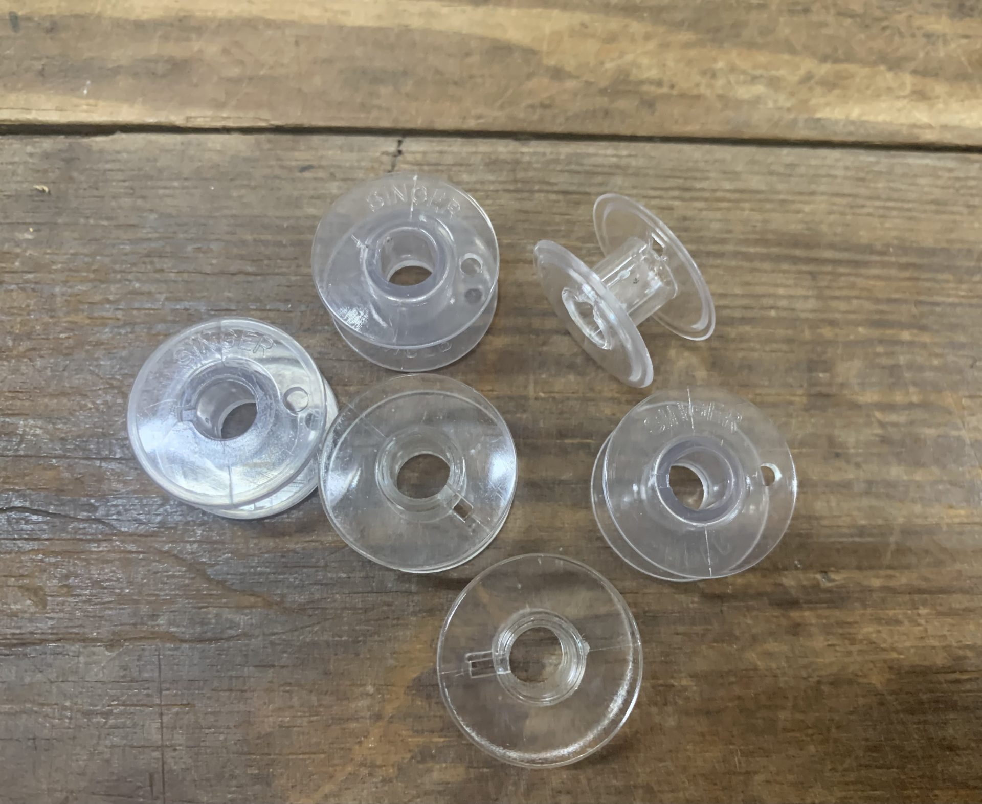 6pc Singer Plastic Bobbins - Picker Place